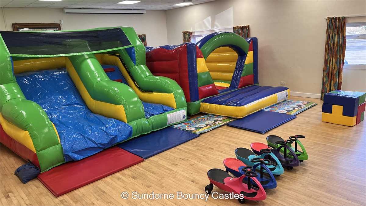 Multi Coloured Bouncy Castle, Slide, Puzzle Cube & Didicars - Bouncy ...